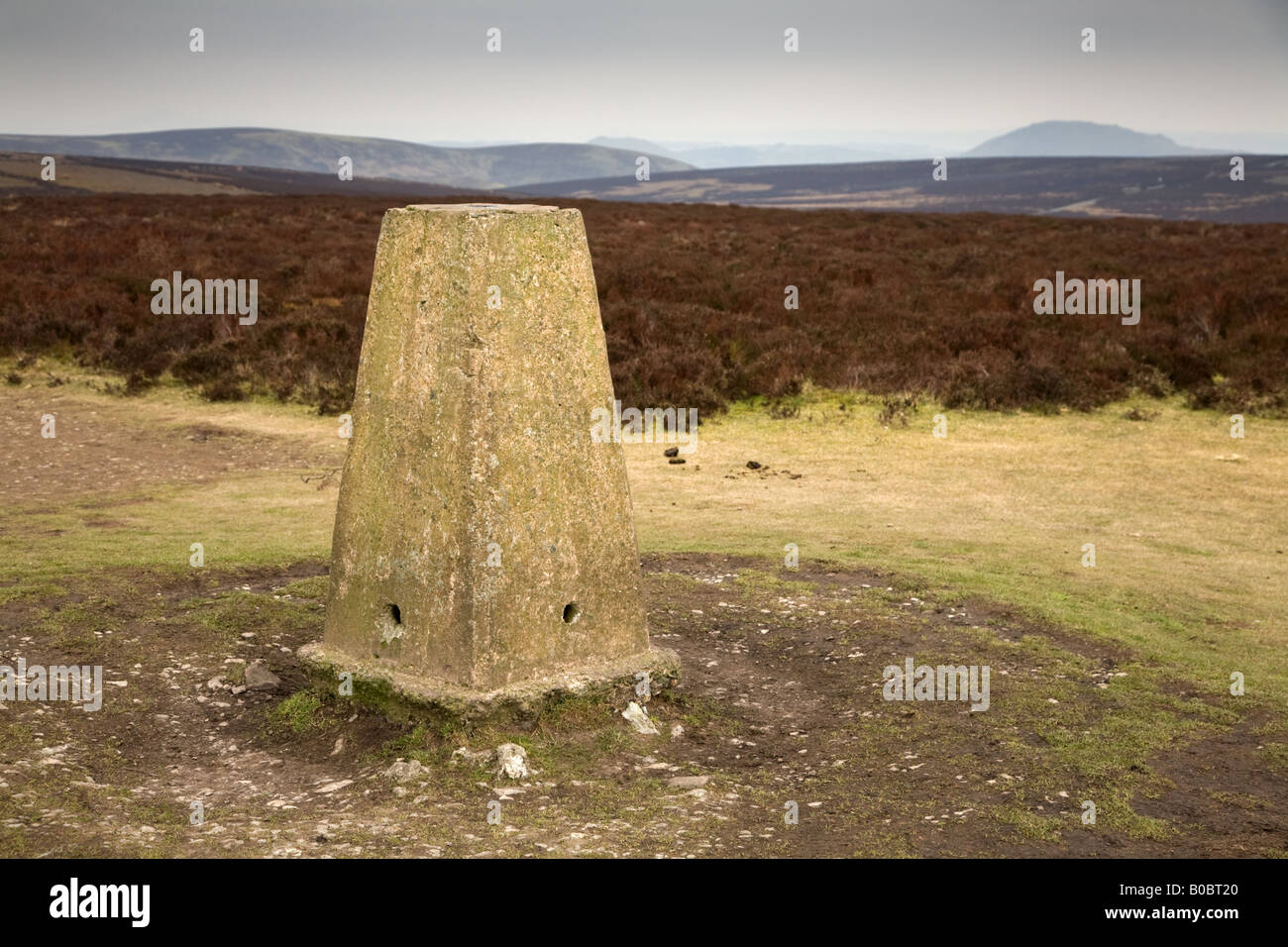 A trig point in Shropshire landscape in UK countryside once used by ...