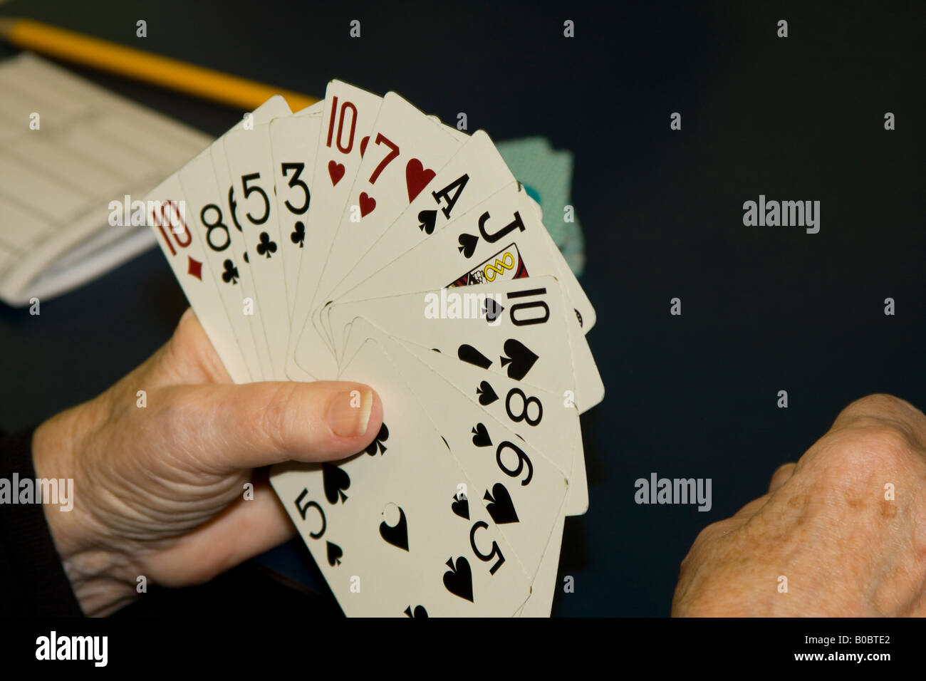In this picture you can see the hands of an elderly person holding a ...