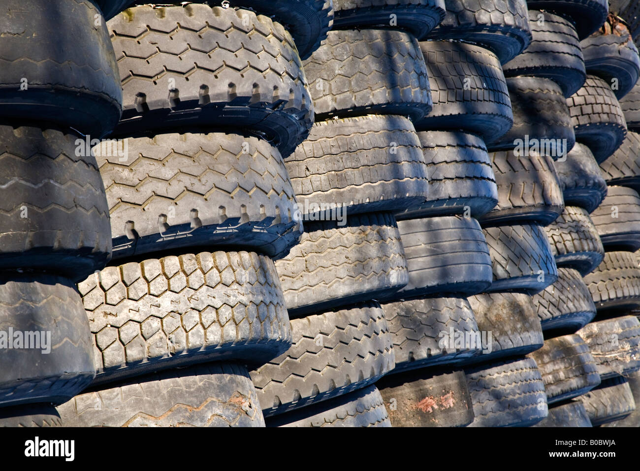 A stack of old worn tyres Scotland Stock Photo - Alamy