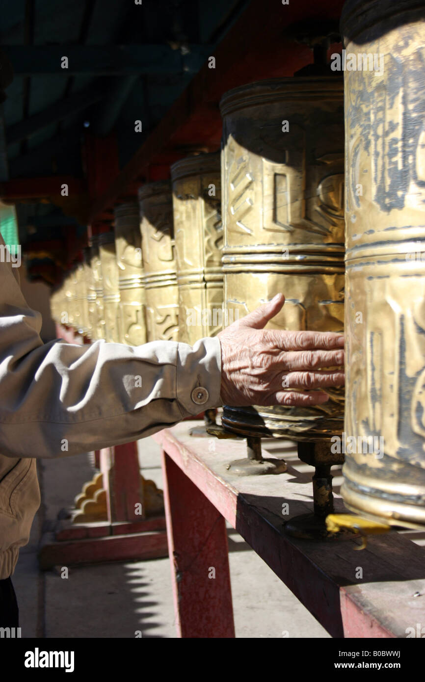 hand on prayer wheel in Gandan monastery, Ulaanbaatar, Mongolia Stock ...