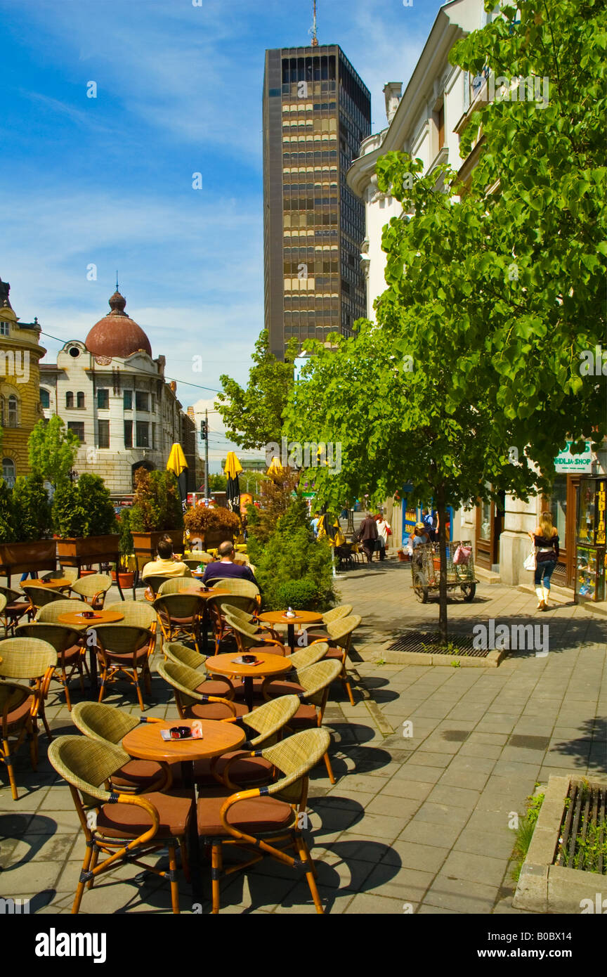 Cafe terrace along Kralia Milana street with Beogradjanca building in ...