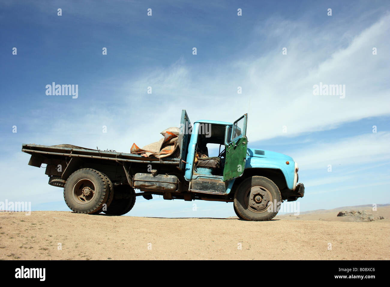 lorry in a desert, Mongolia Stock Photo - Alamy