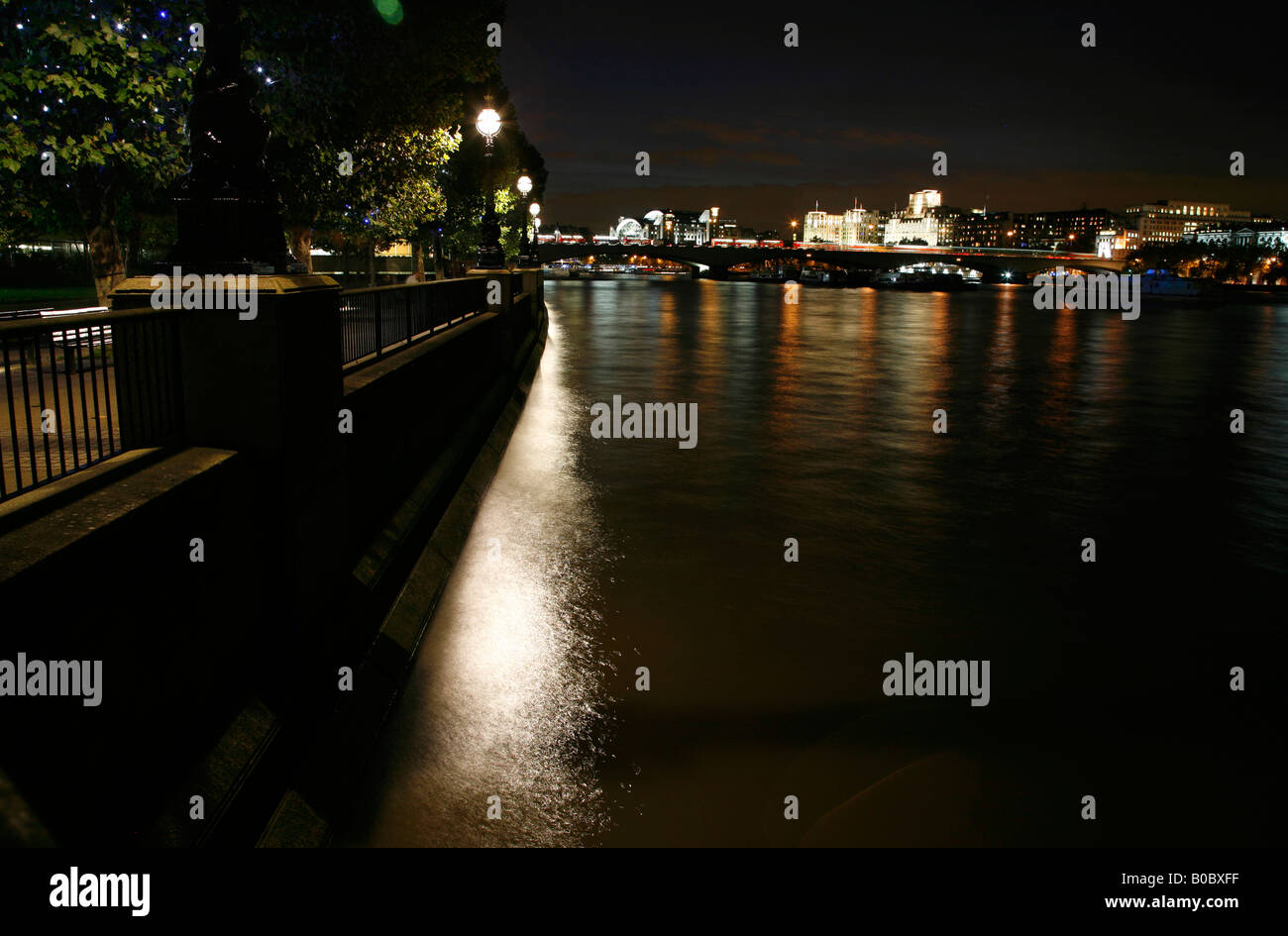 Night time view of the Queens Walk and Waterloo Bridge, South Bank ...