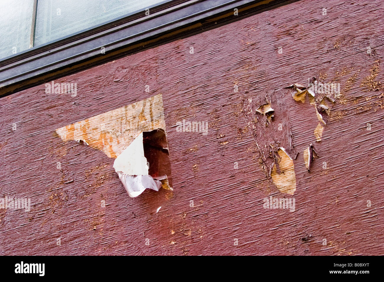 Paint peeling on the wall of a building Stock Photo - Alamy