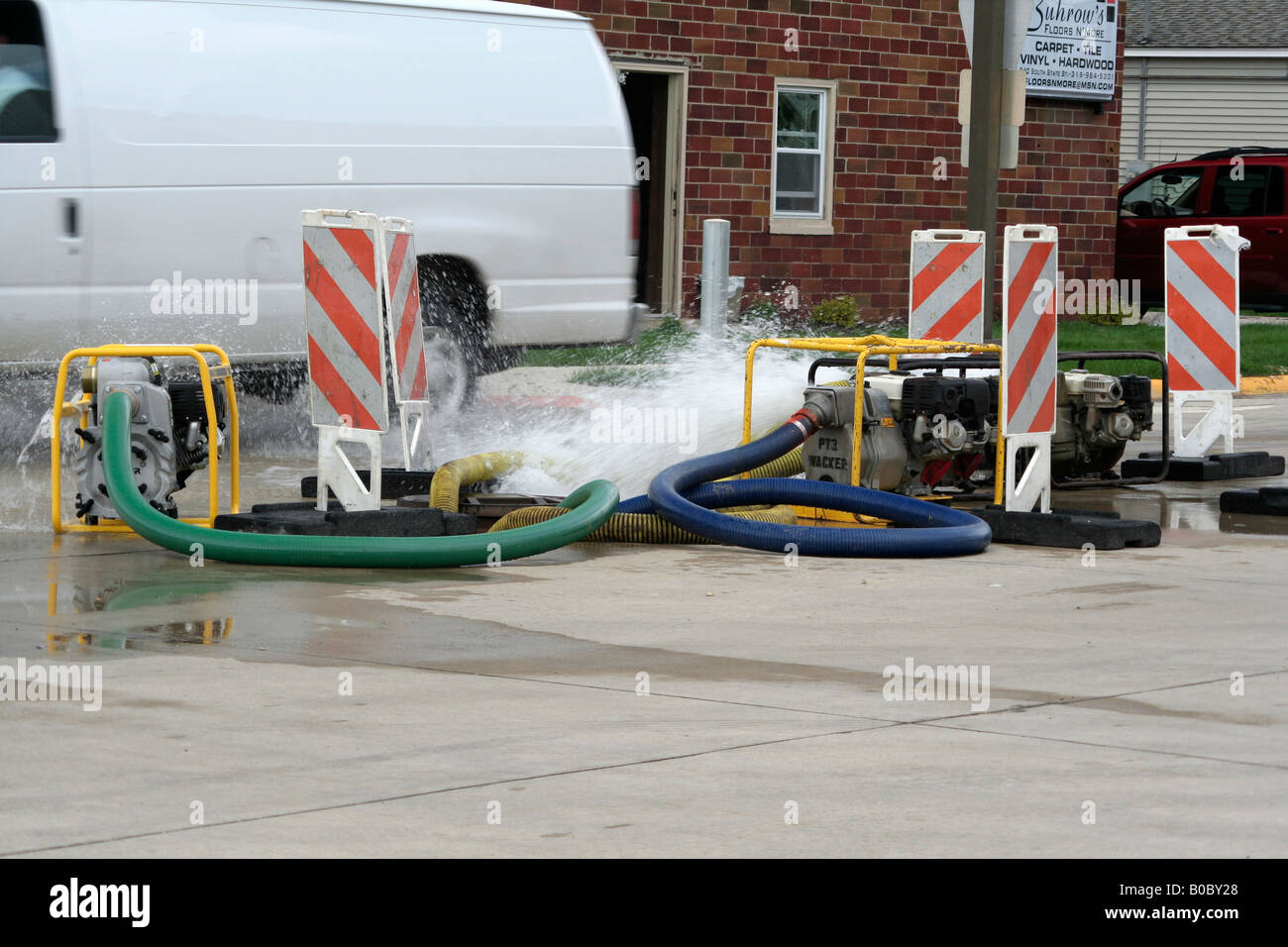 Hosepipe hose pipe draining drainage pumping water out hoses hi-res ...