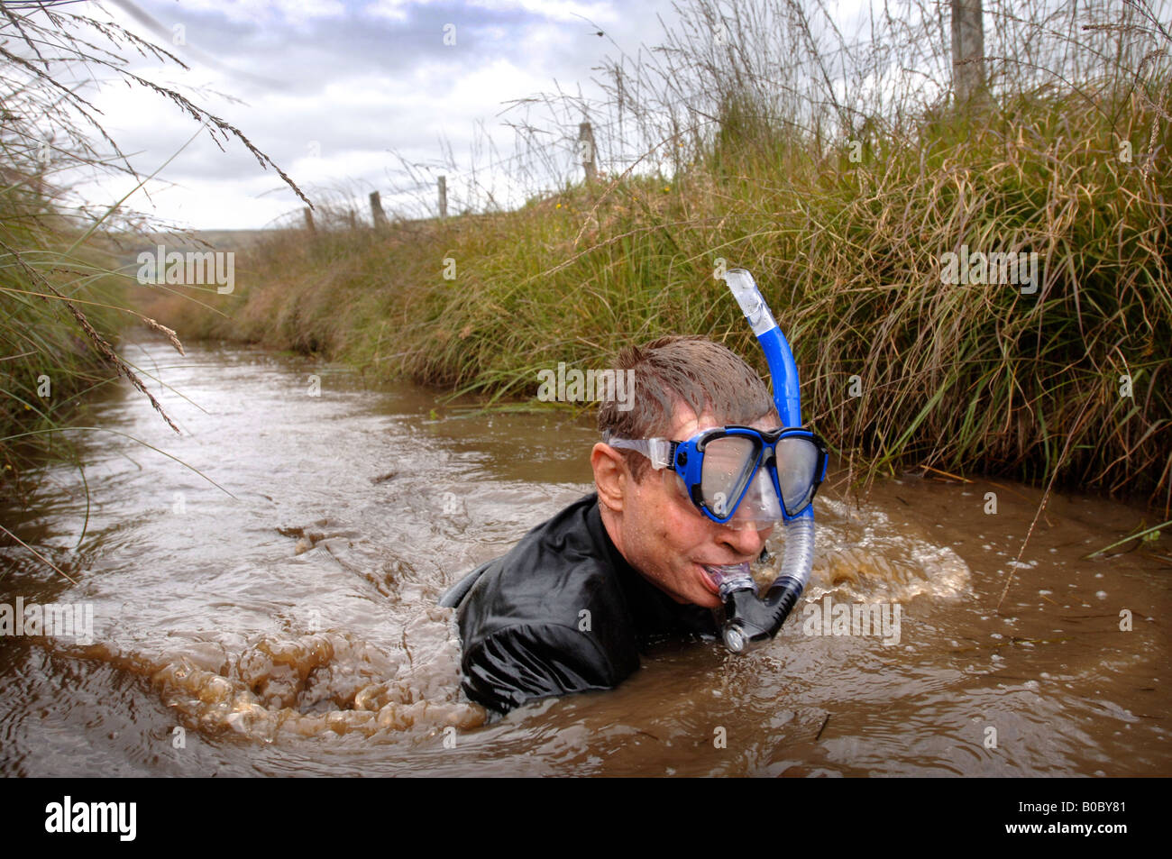 A COMPETITOR IN THE INTERNATIONAL BOG SNORKELLING CHAMPIONSHIPS AT ...