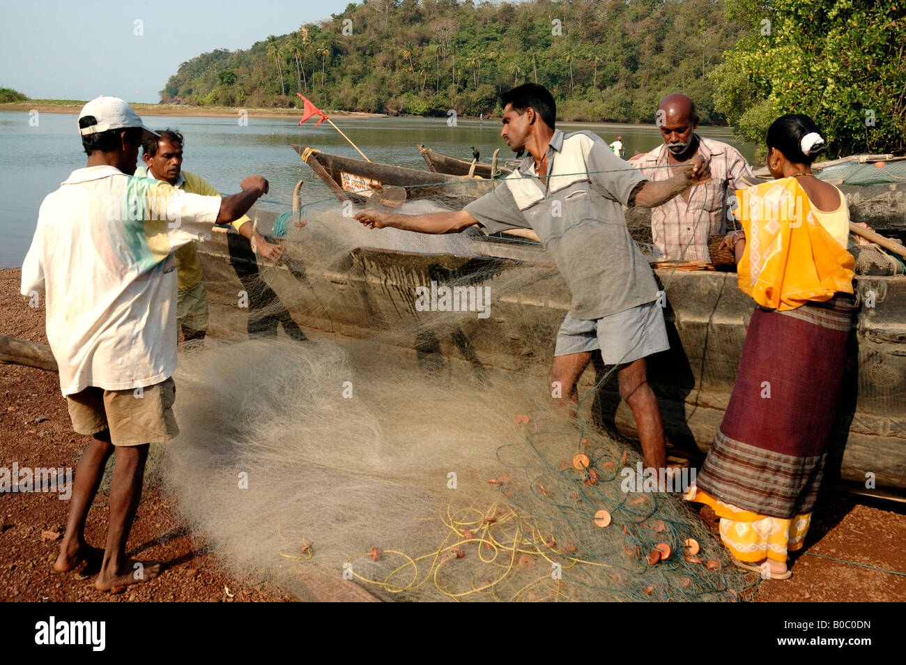 Goa, India. Beach scene. Fishermen. Palolem Beach. Sunset Stock Photo ...