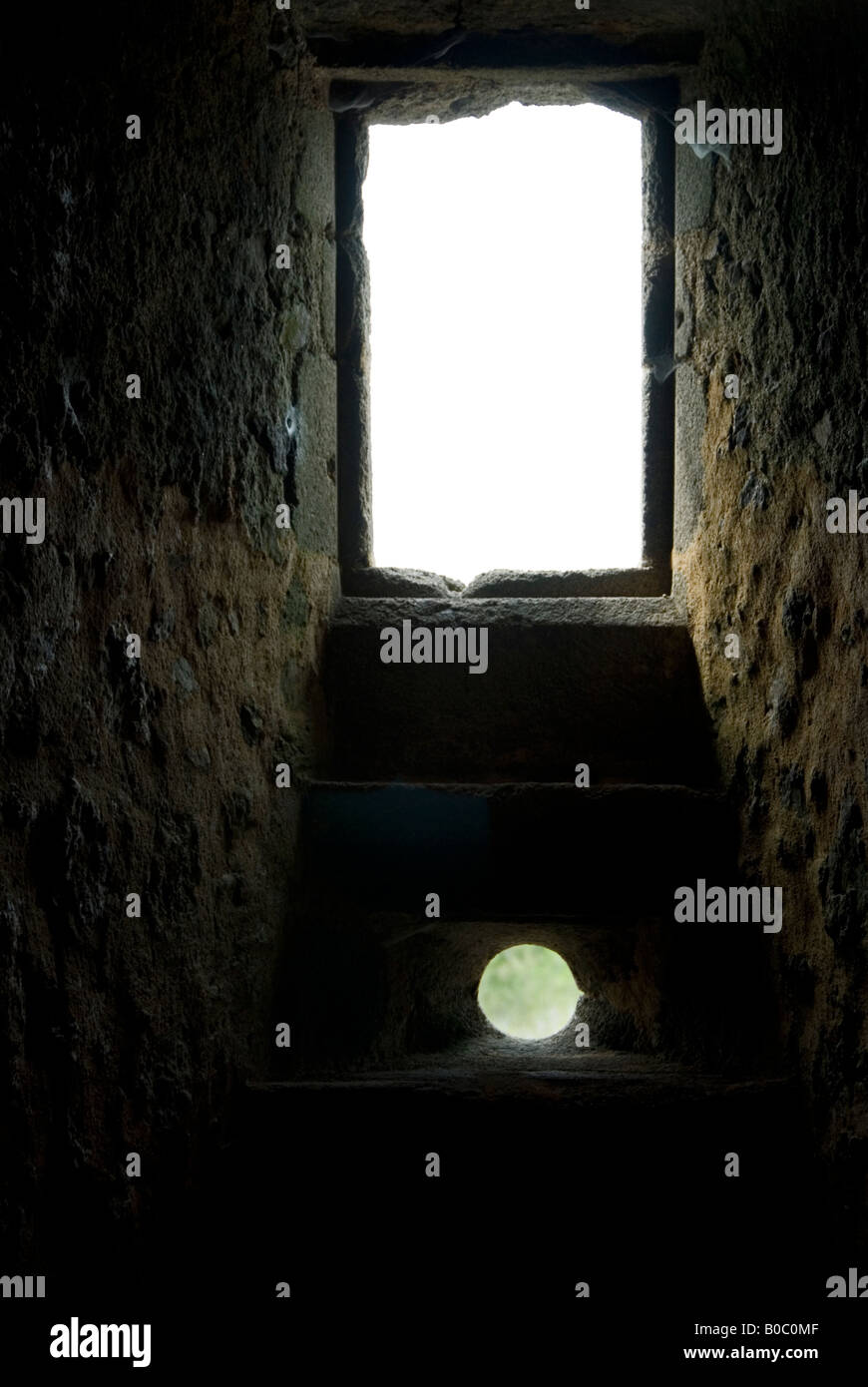 Stock photo of light entering a window in an old medieval castles wall ...