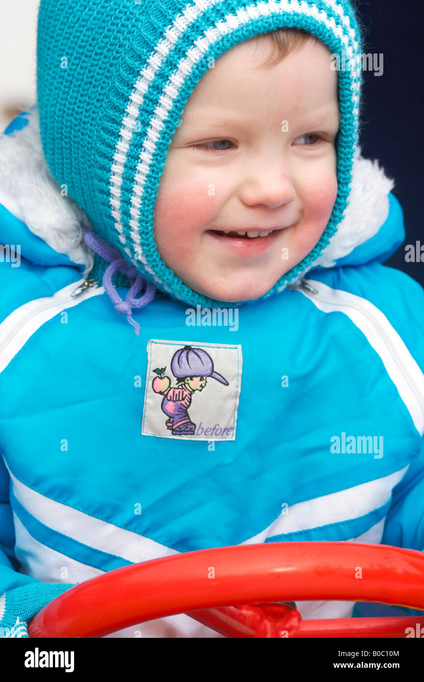 small boy play (steer with car) on playground Stock Photo - Alamy