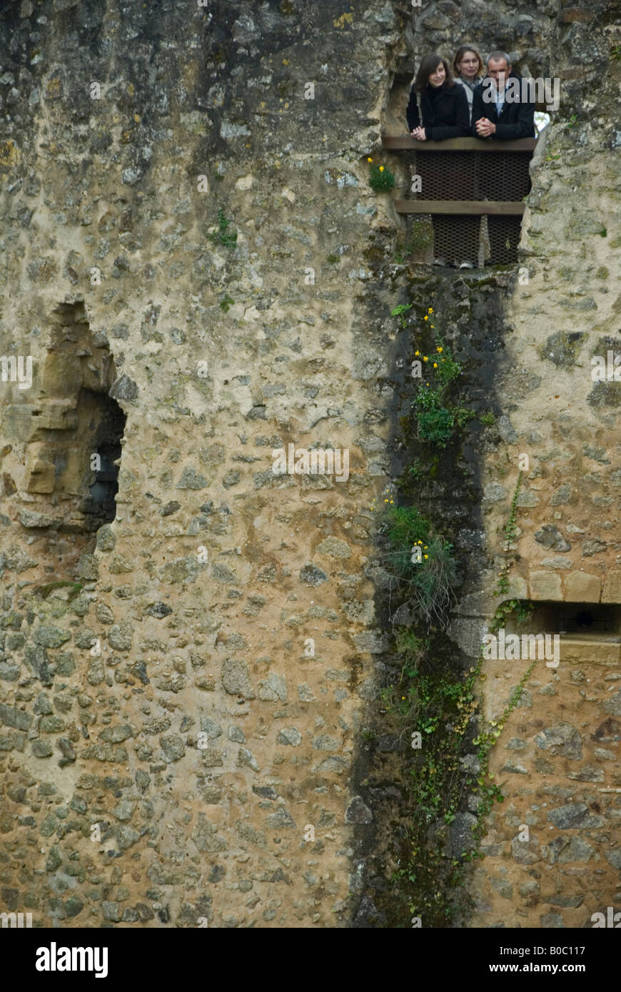 Stock photo of a group of people standing on the wall of the castle at ...