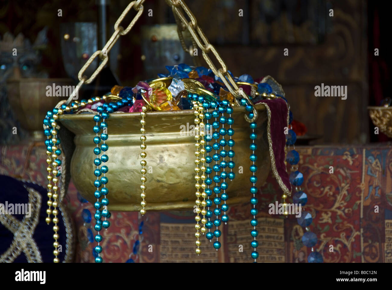 Stock photo of a bowl of jewels hanging on a chain Stock Photo - Alamy