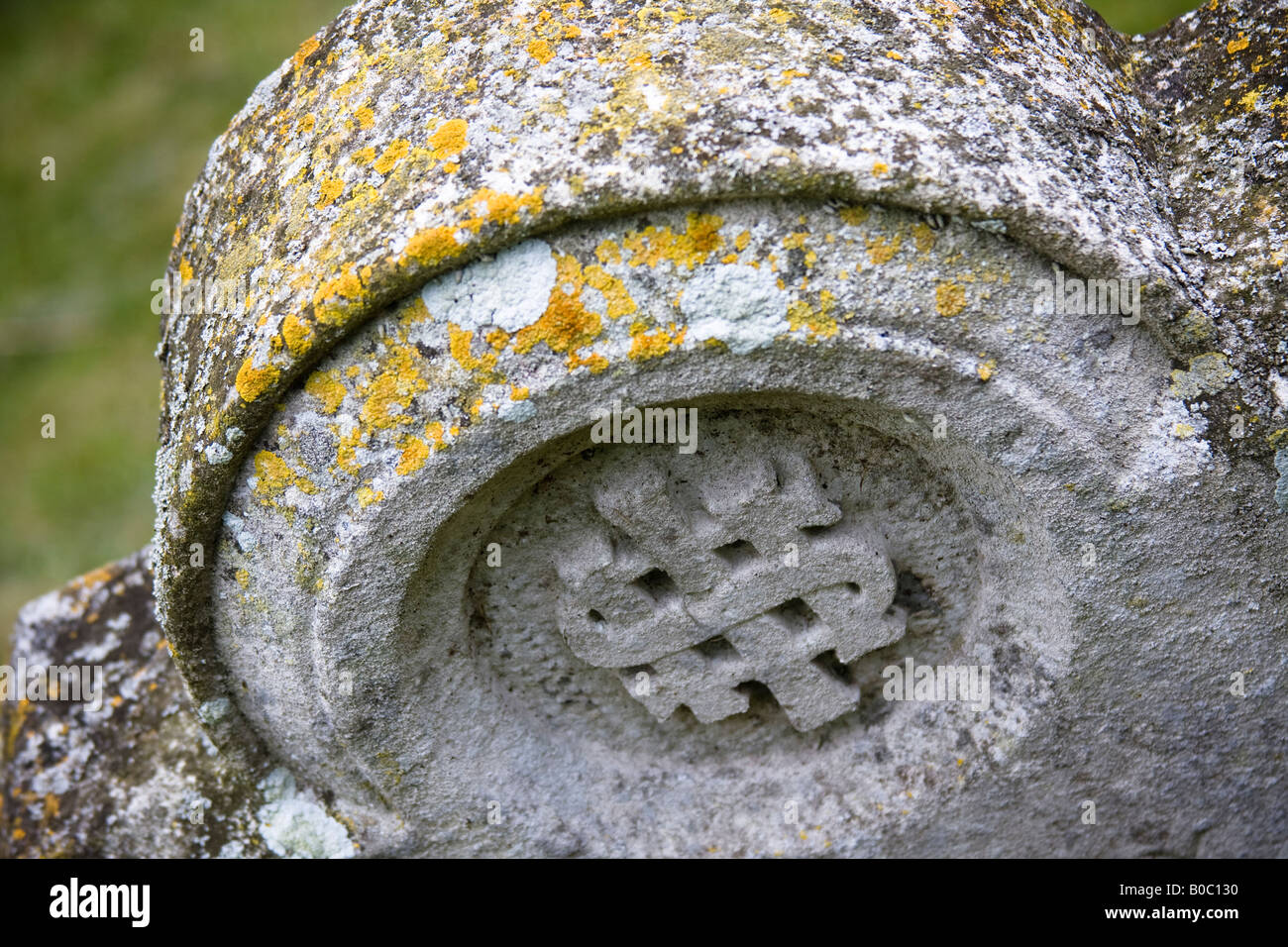 Decorated head stone with floral motif Stock Photo - Alamy