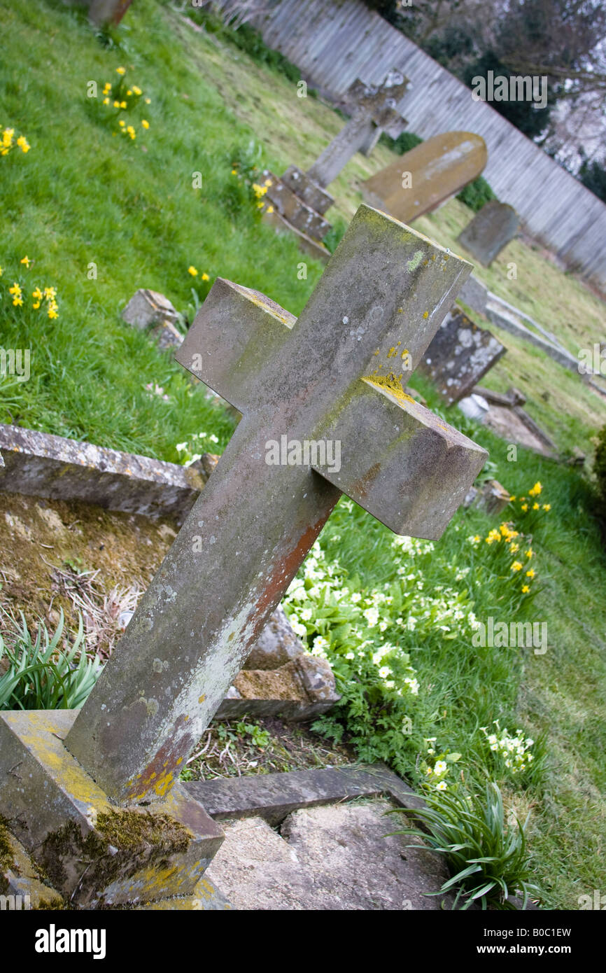 Leaning cross in graveyard hi-res stock photography and images - Alamy