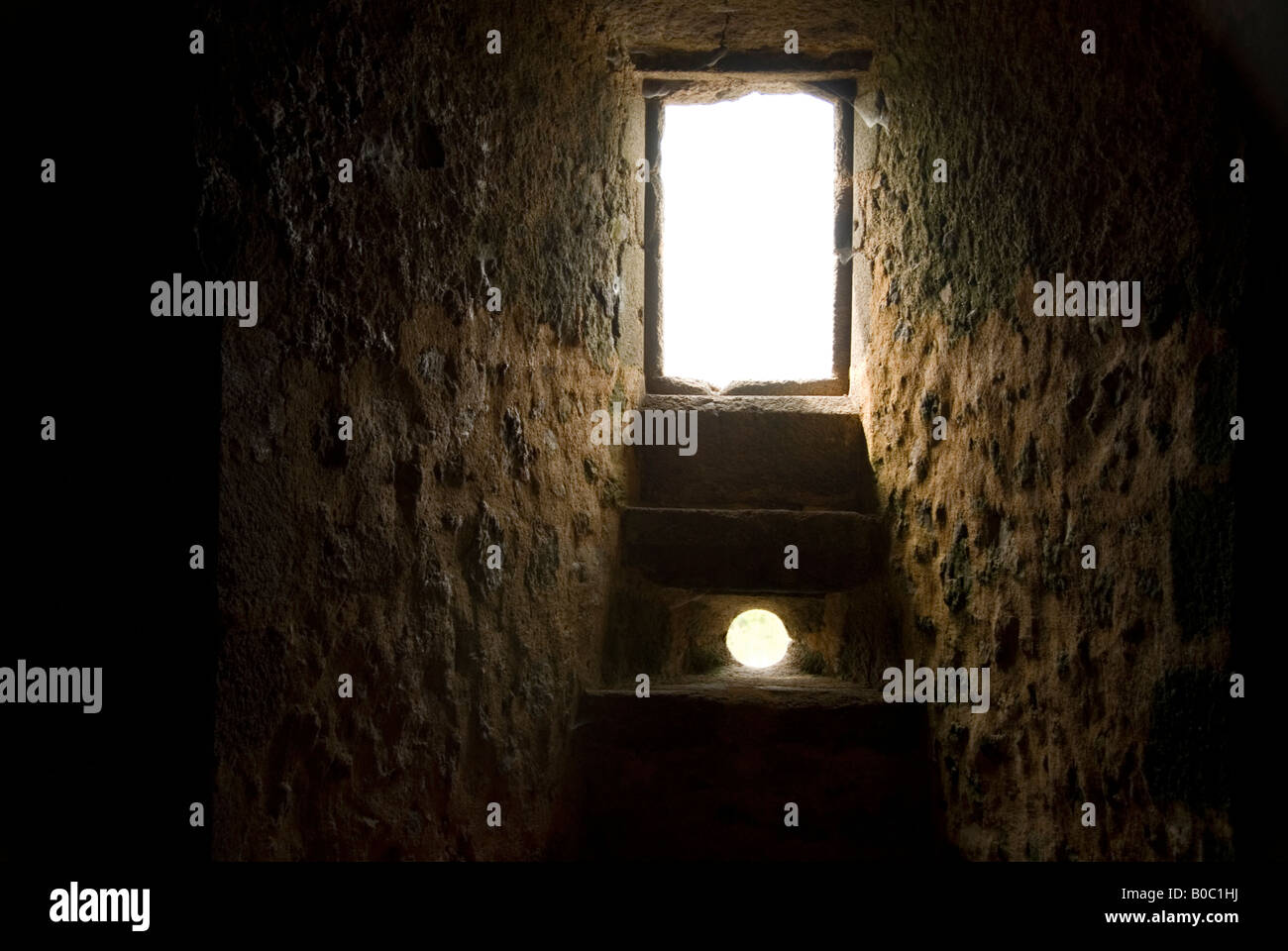 Stock photo of light entering a window in an old medieval castles wall ...
