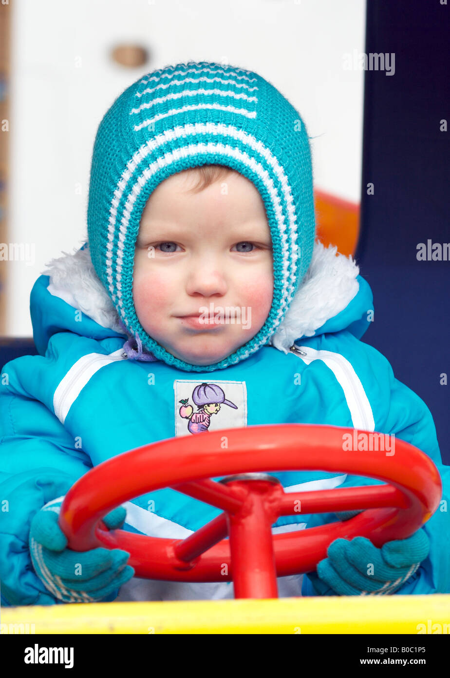 small boy play (steer with car) on playground Stock Photo - Alamy