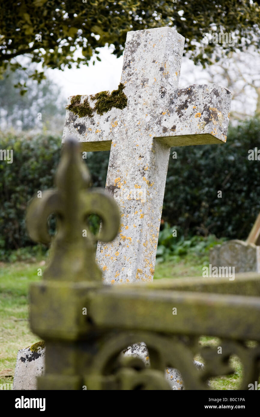 Leaning cross in graveyard hi-res stock photography and images - Alamy
