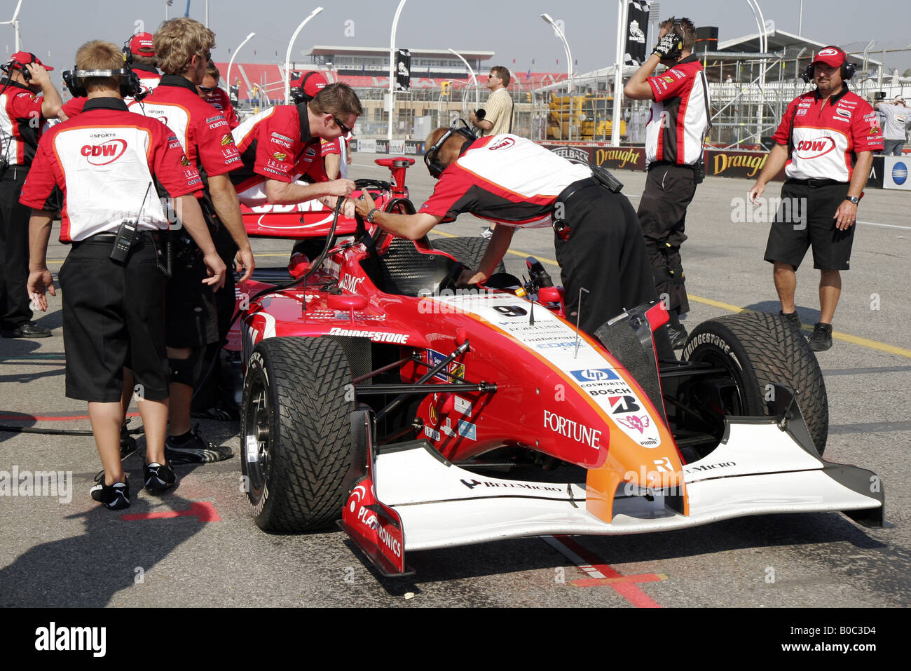Race car driver and pit crew at the Toronto Grand Prix, Molson Indy in ...
