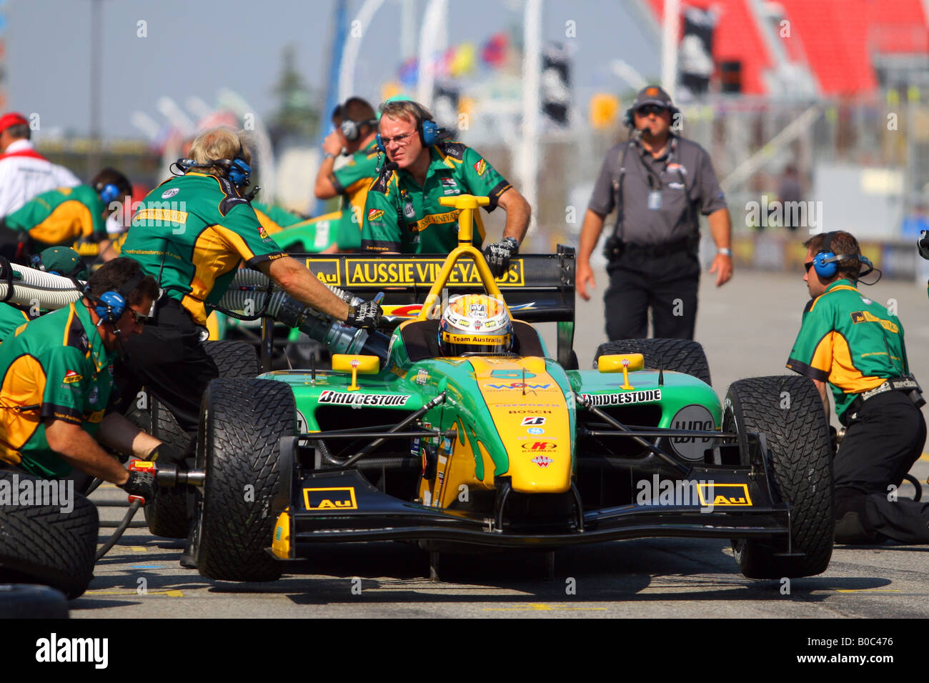 Race car driver and pit crew at the Toronto Grand Prix, Molson Indy in ...