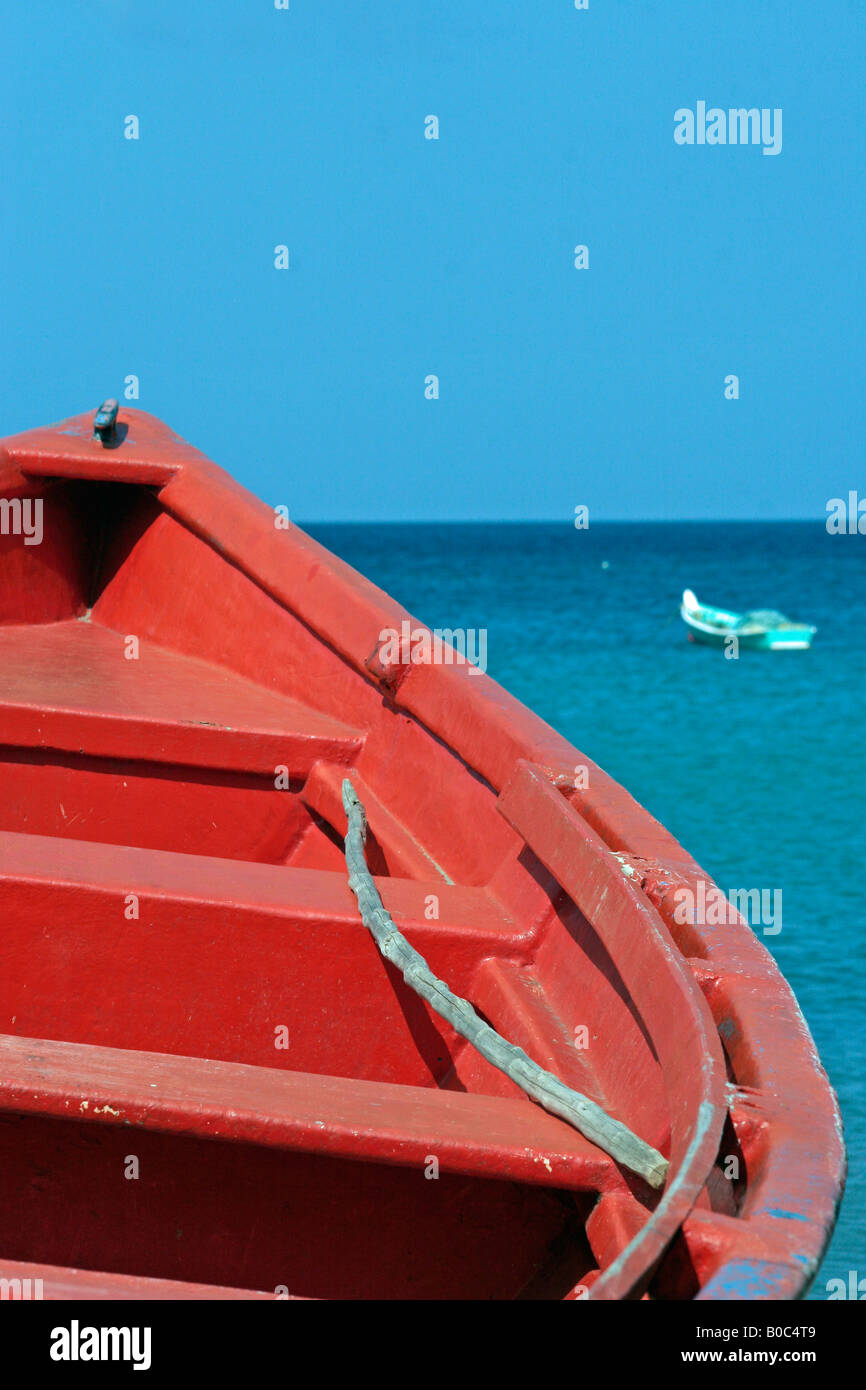Bright red boat Stock Photo - Alamy