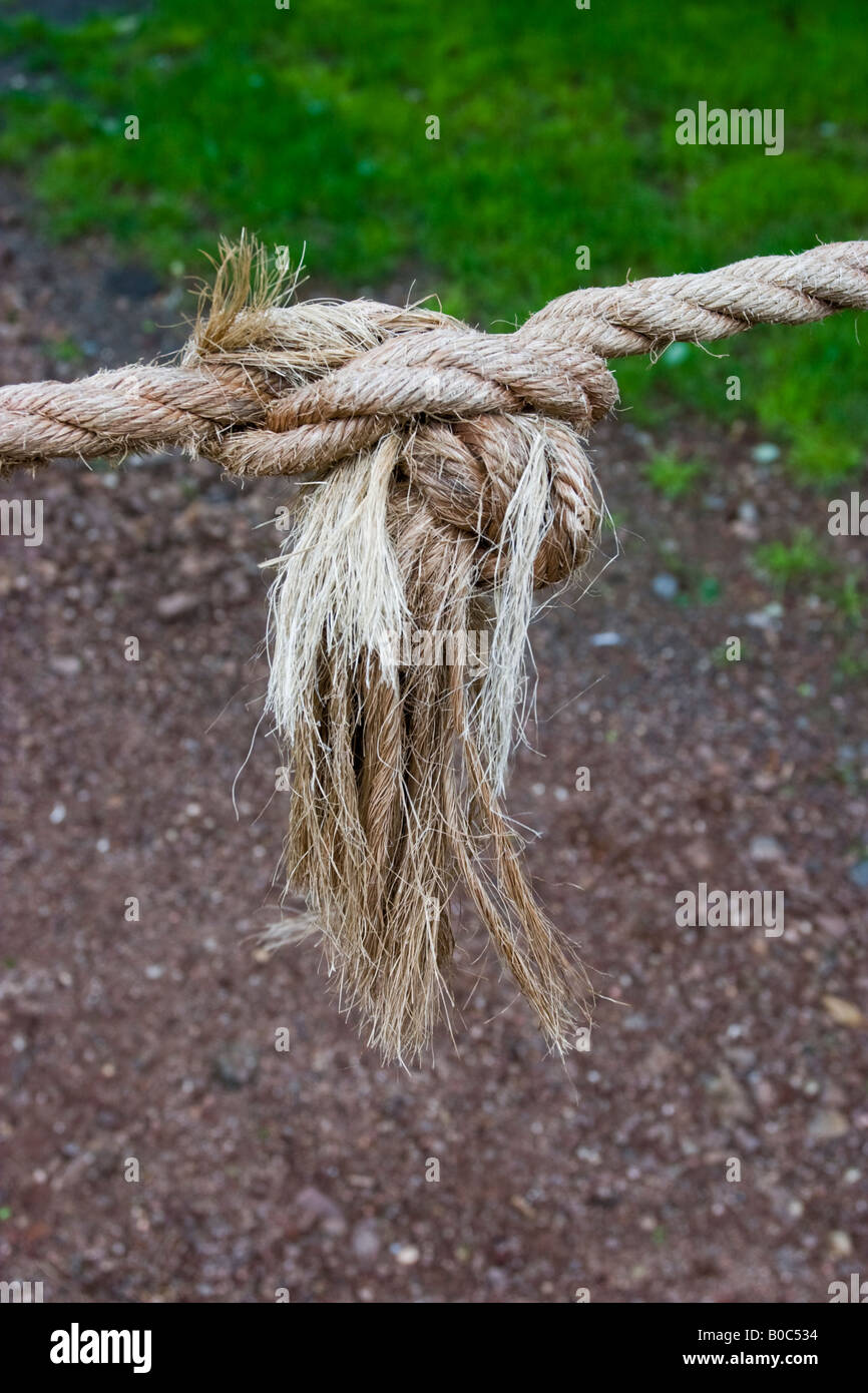 Knot in a thick piece of rope Stock Photo - Alamy