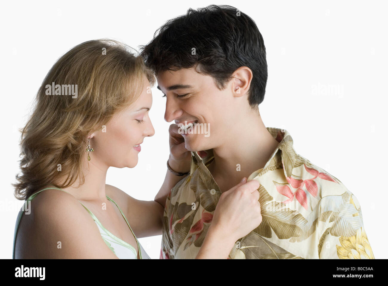 Woman adjusting shirt collar hi-res stock photography and images - Alamy