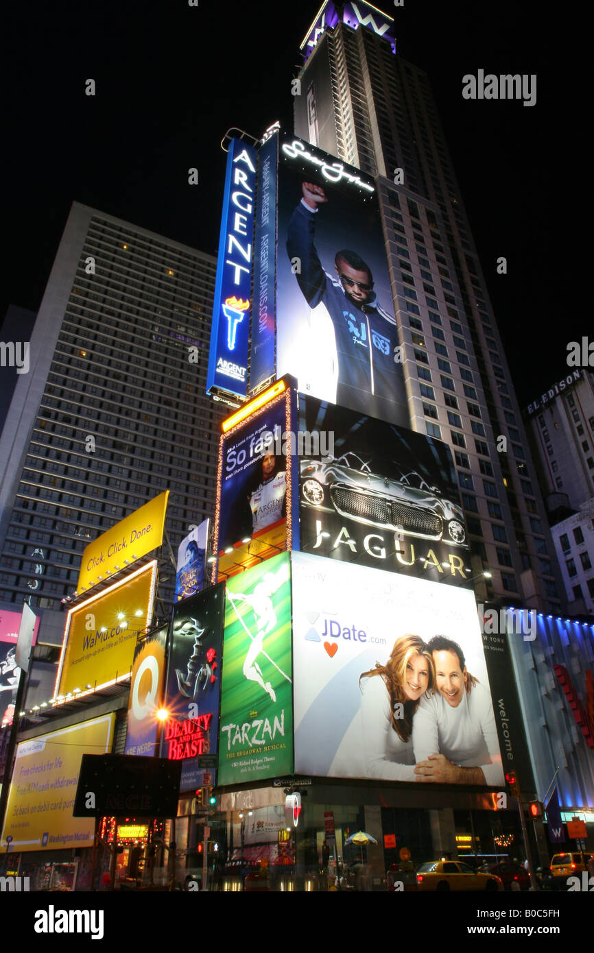 Color photo of times square buildings at night in New York, NY Stock ...