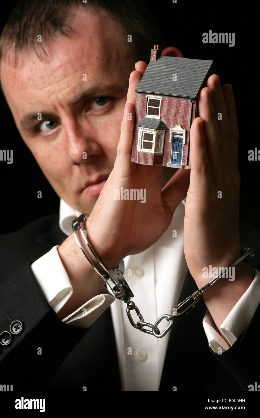 Man male hand cuffs model house hi-res stock photography and images - Alamy