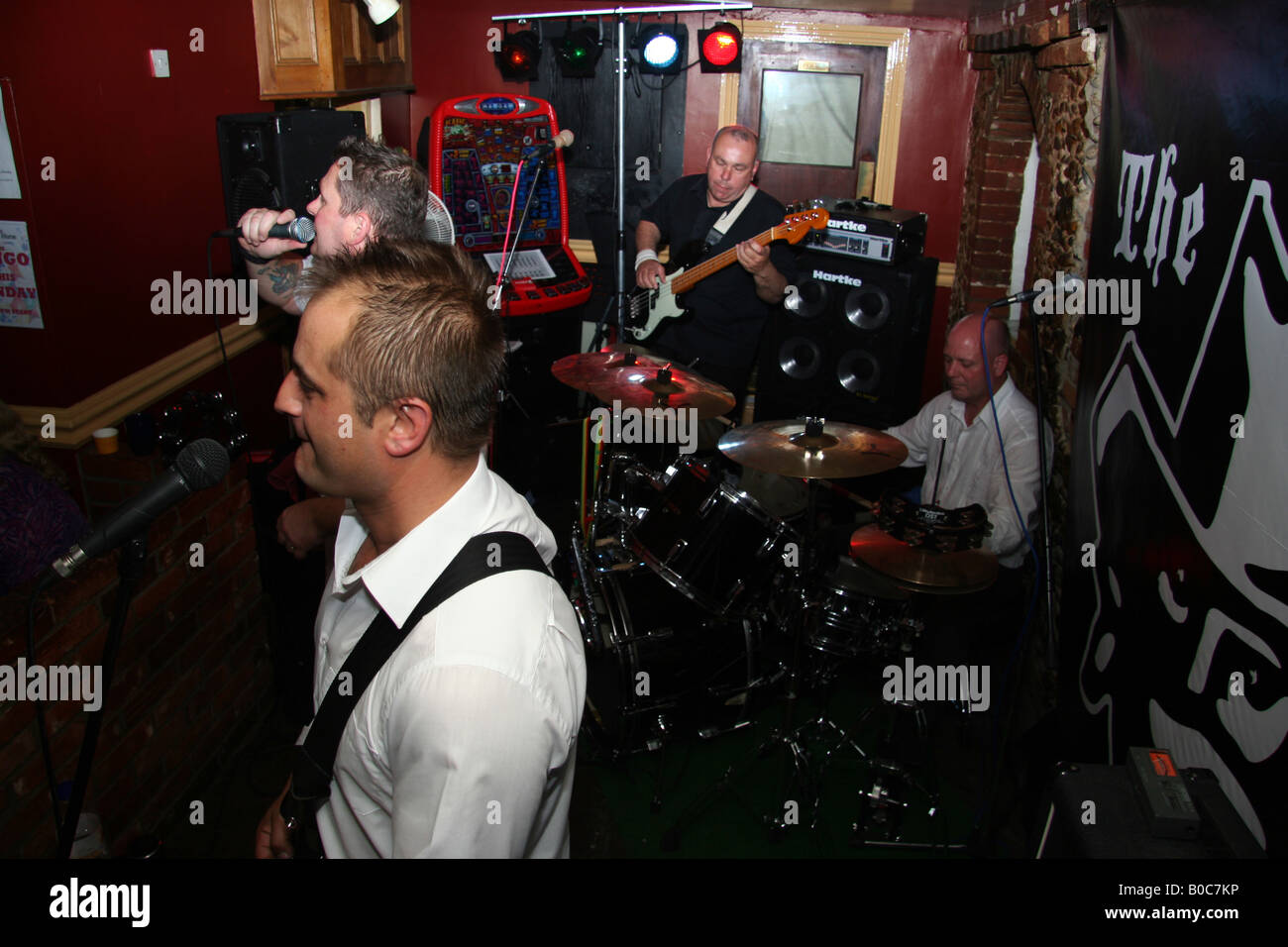 Pub rock band jammed into the corner of a country pub Stock Photo - Alamy