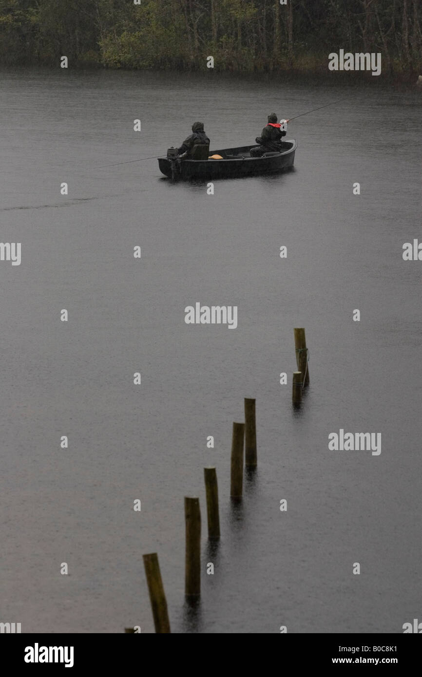 Fishing in the rain on Loch Awe Scotland UK Stock Photo - Alamy