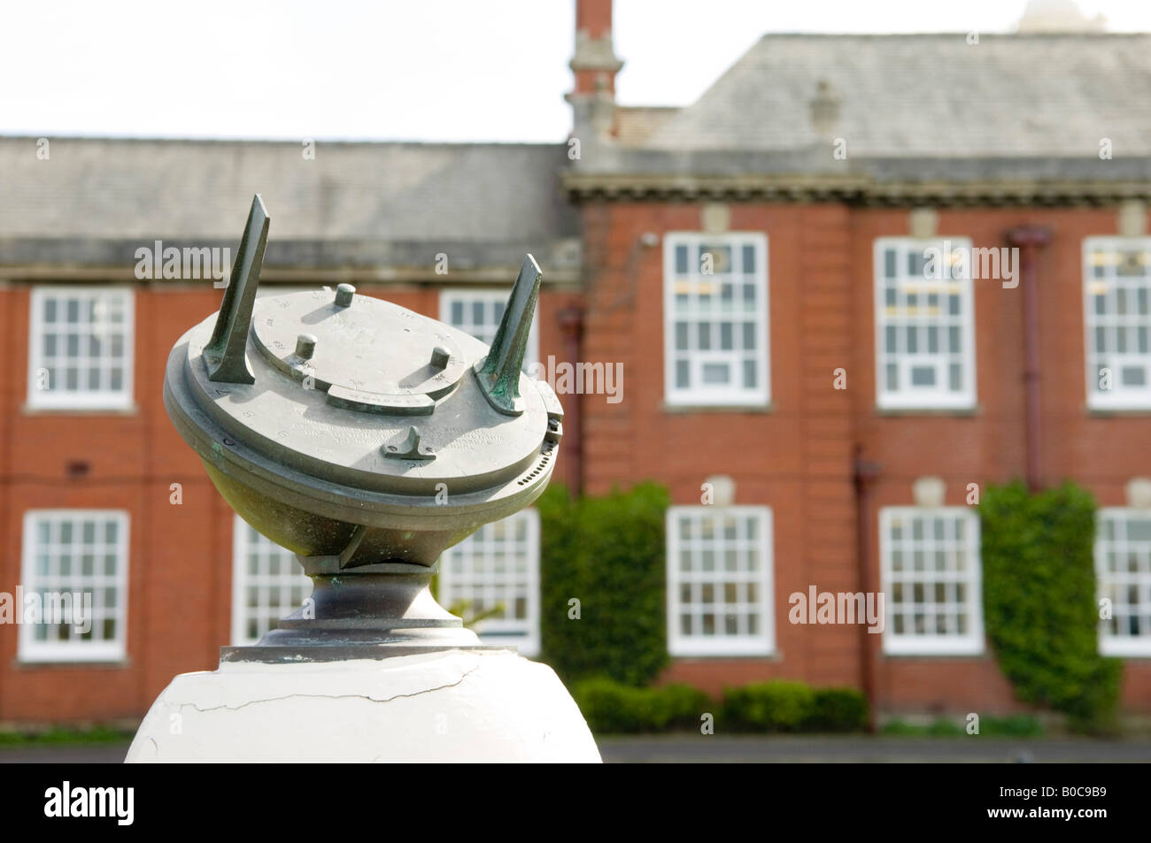 Sundial in school grounds Stock Photo - Alamy