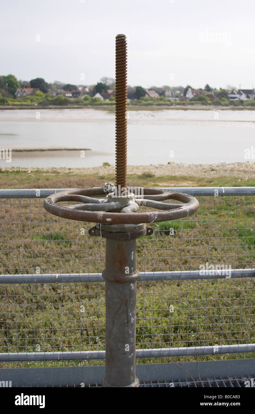 Sluice gate control wheel Stock Photo - Alamy