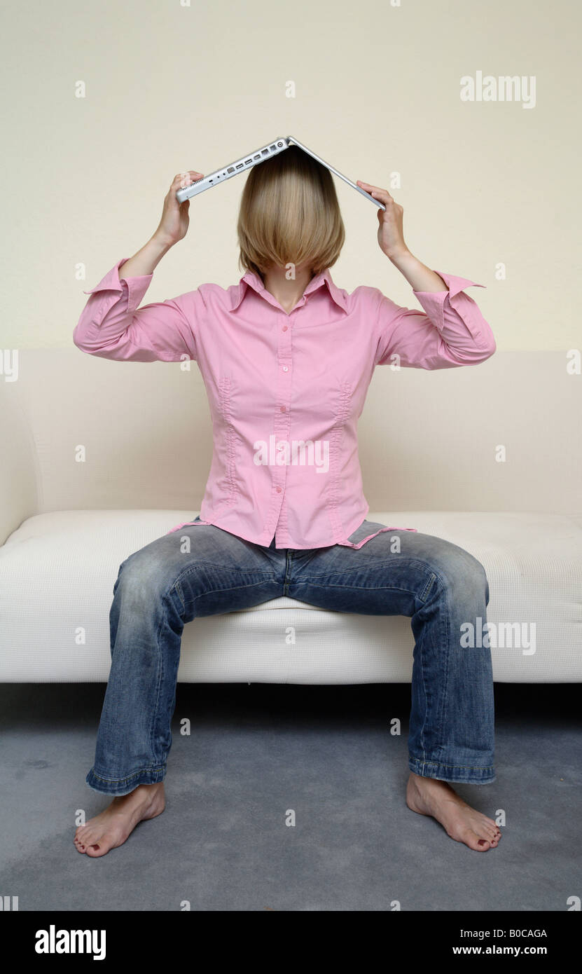 Woman covered head laptop hi-res stock photography and images - Alamy