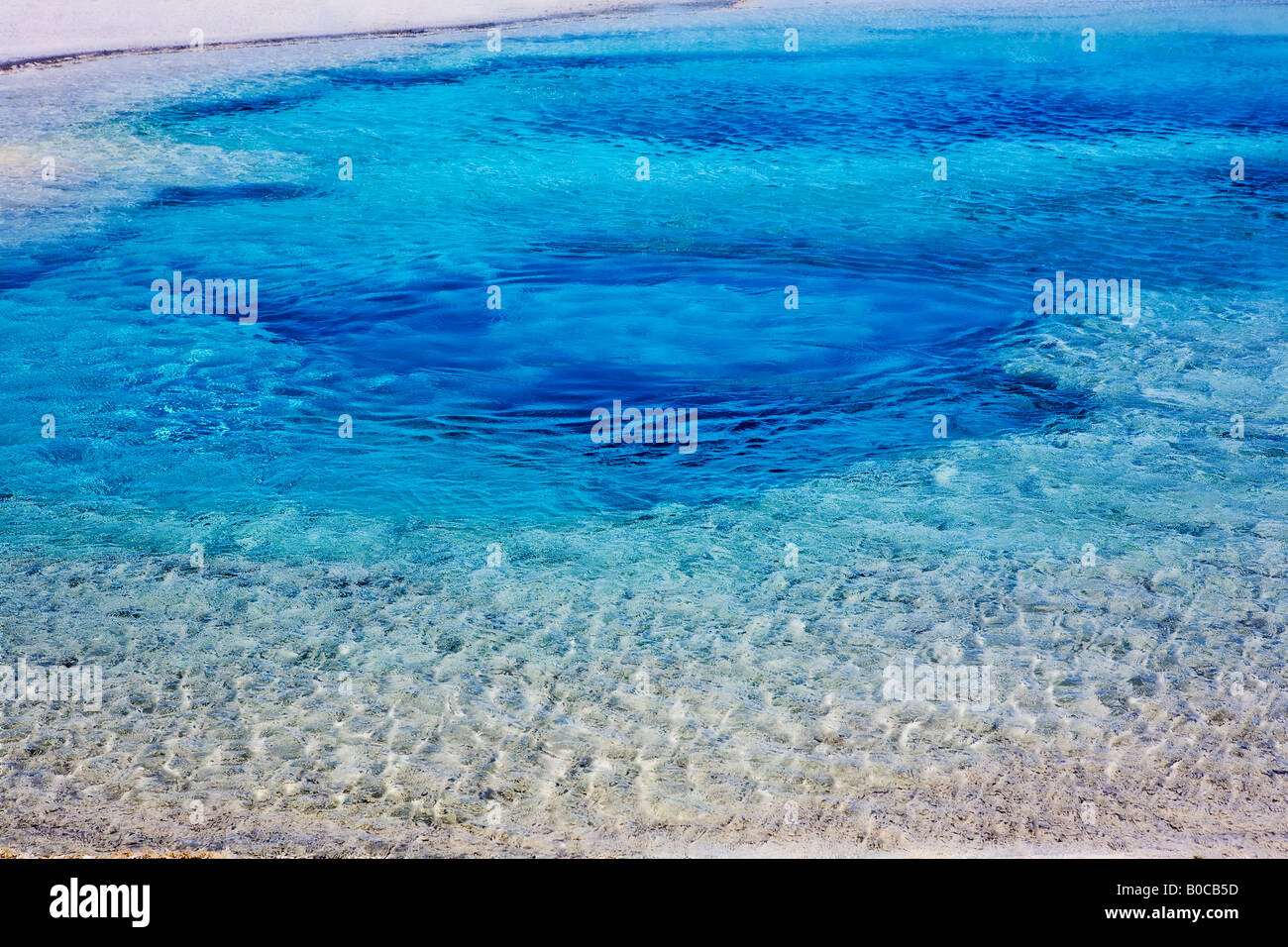 Image looking down and into the bright blue boiling waters of Emerald ...