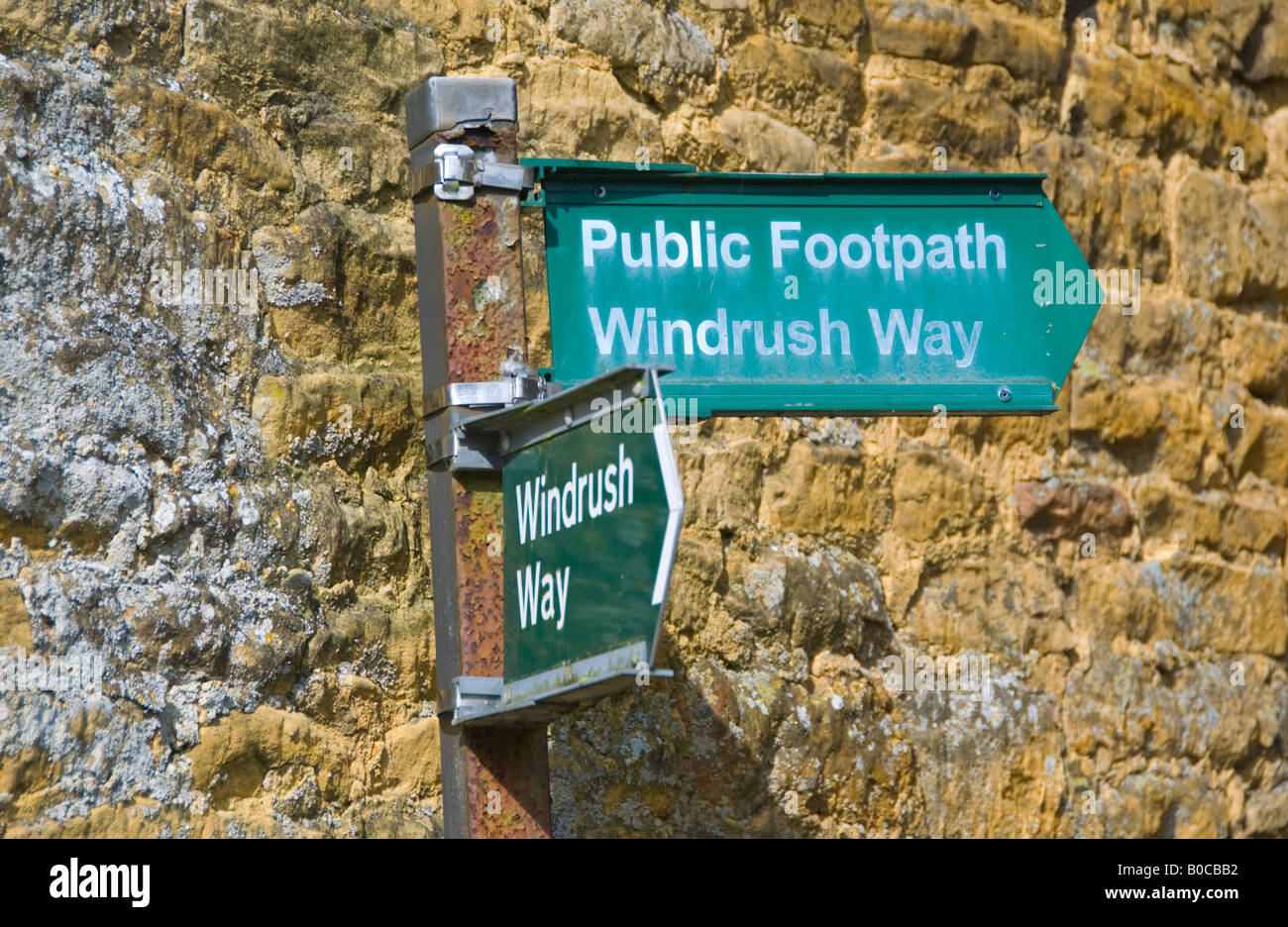 Public footpath sign for Windrush Way in village of Bourton on the ...