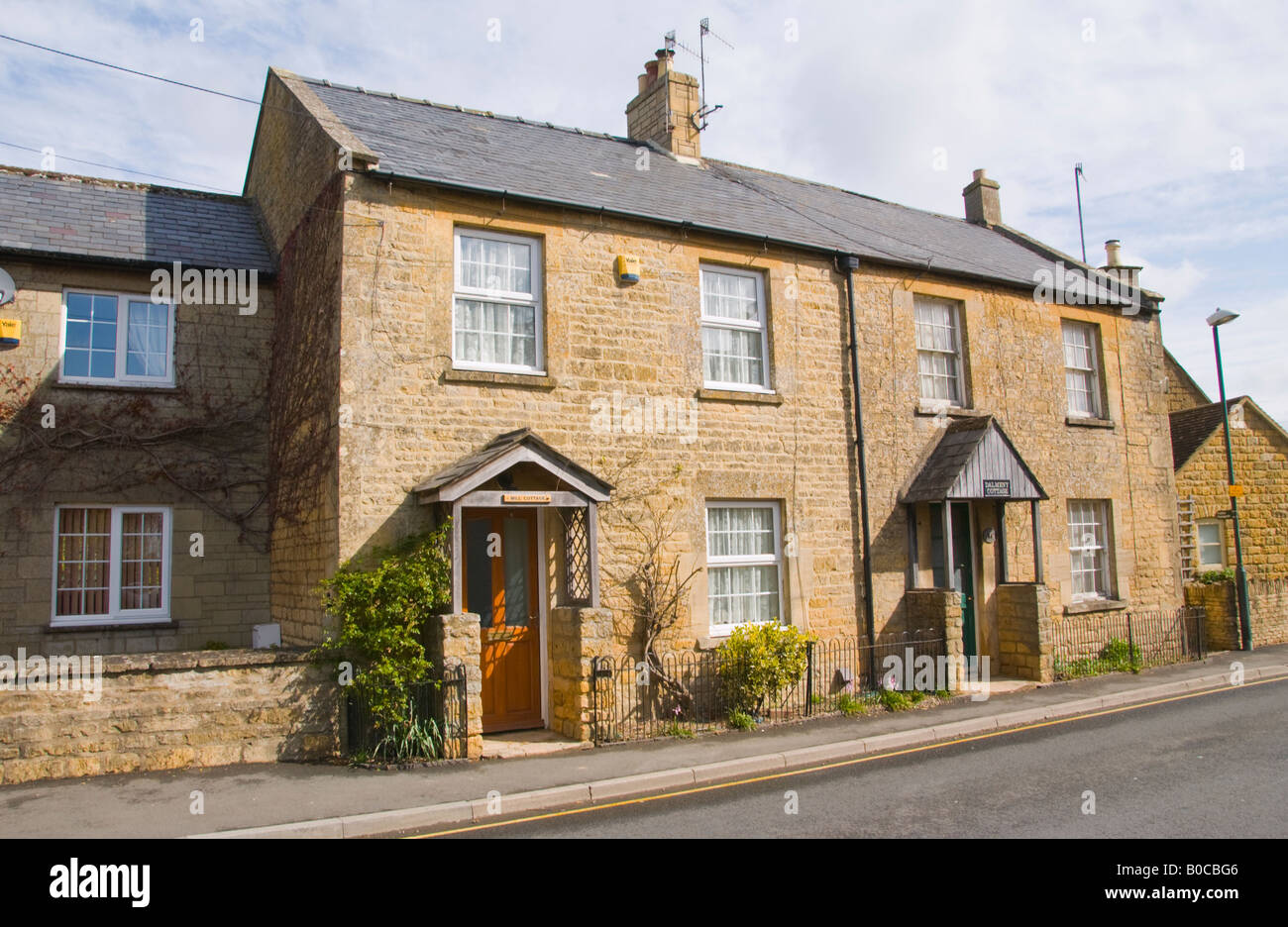 Traditional terraced cottages in Cotswolds England UK with upvc and ...