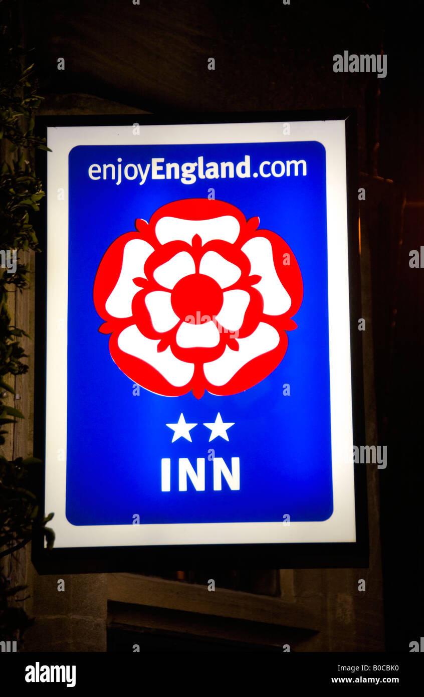 Illuminated sign on Old New Inn village of Bourton on the Water ...