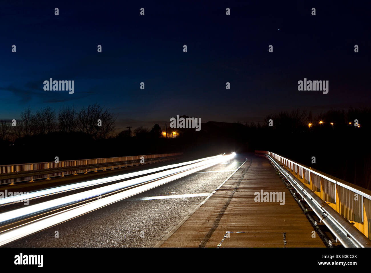 Motorway at night dusk Stock Photo - Alamy