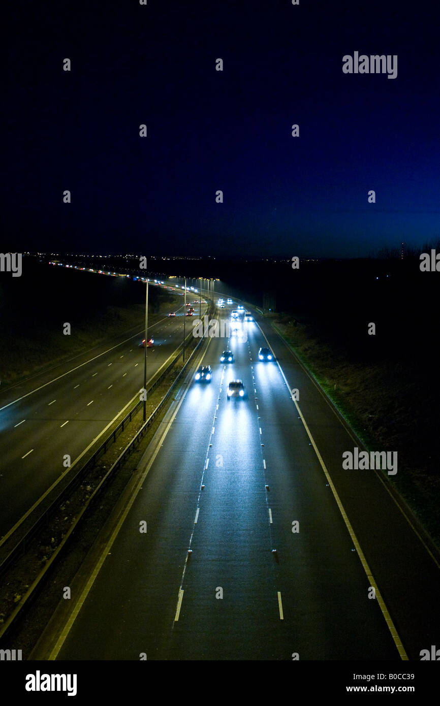 Motorway at night dusk Stock Photo - Alamy