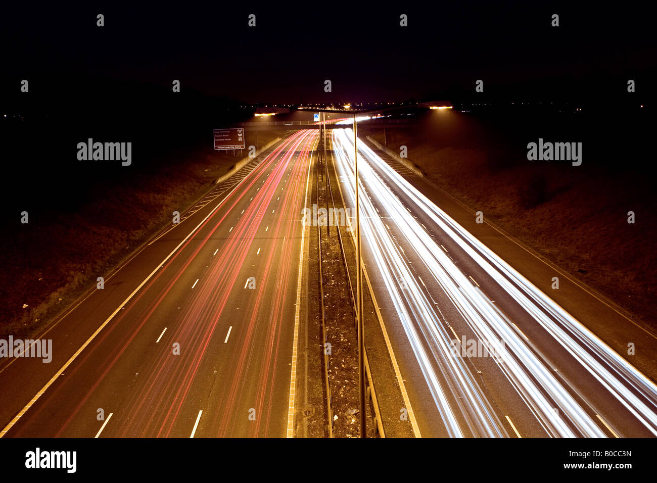 Motorway at night dusk Stock Photo - Alamy
