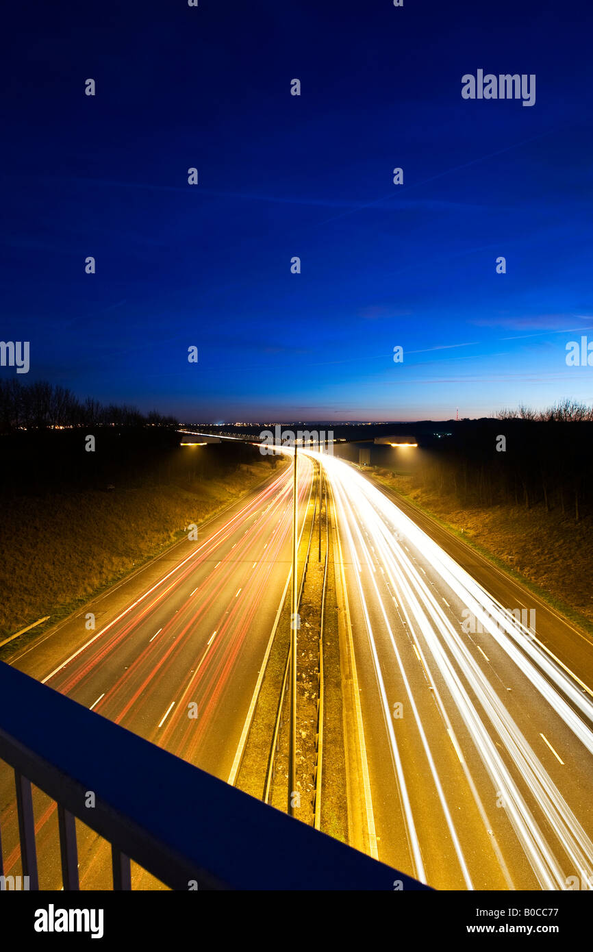 Motorway at night dusk Stock Photo - Alamy