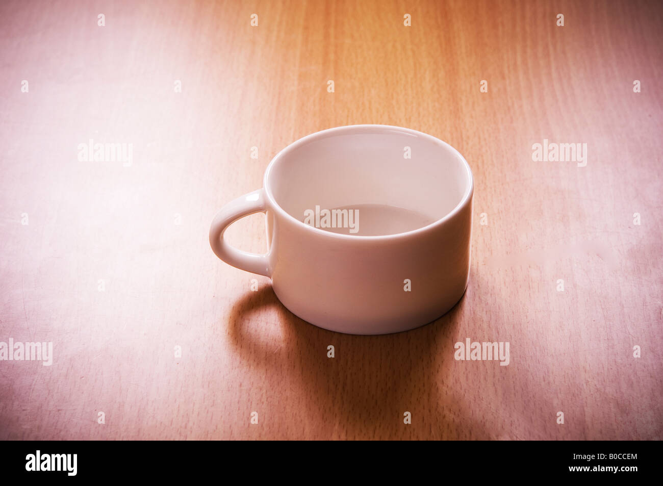 one empty white cup Stock Photo - Alamy