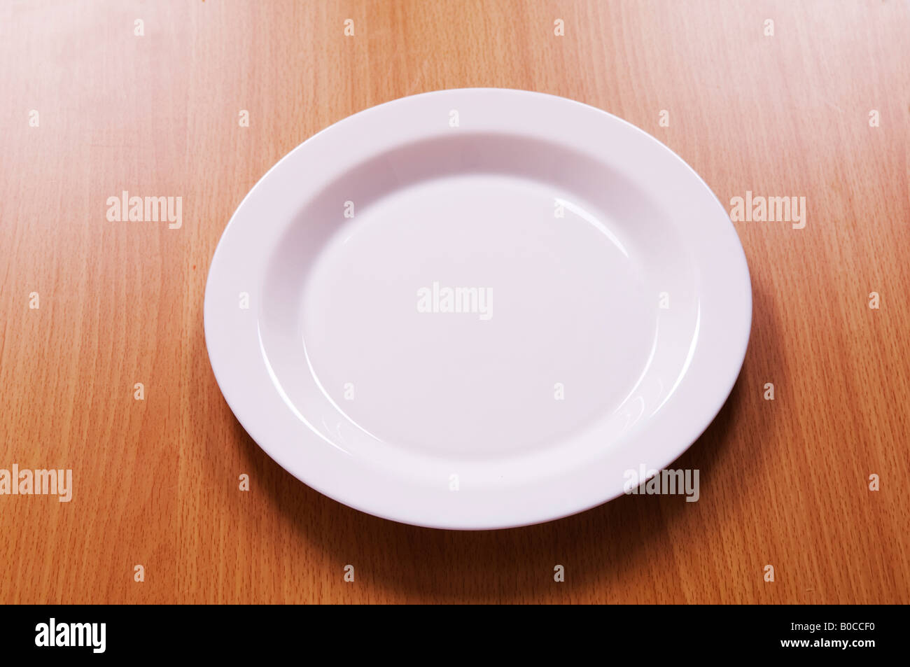 One white plate Stock Photo - Alamy
