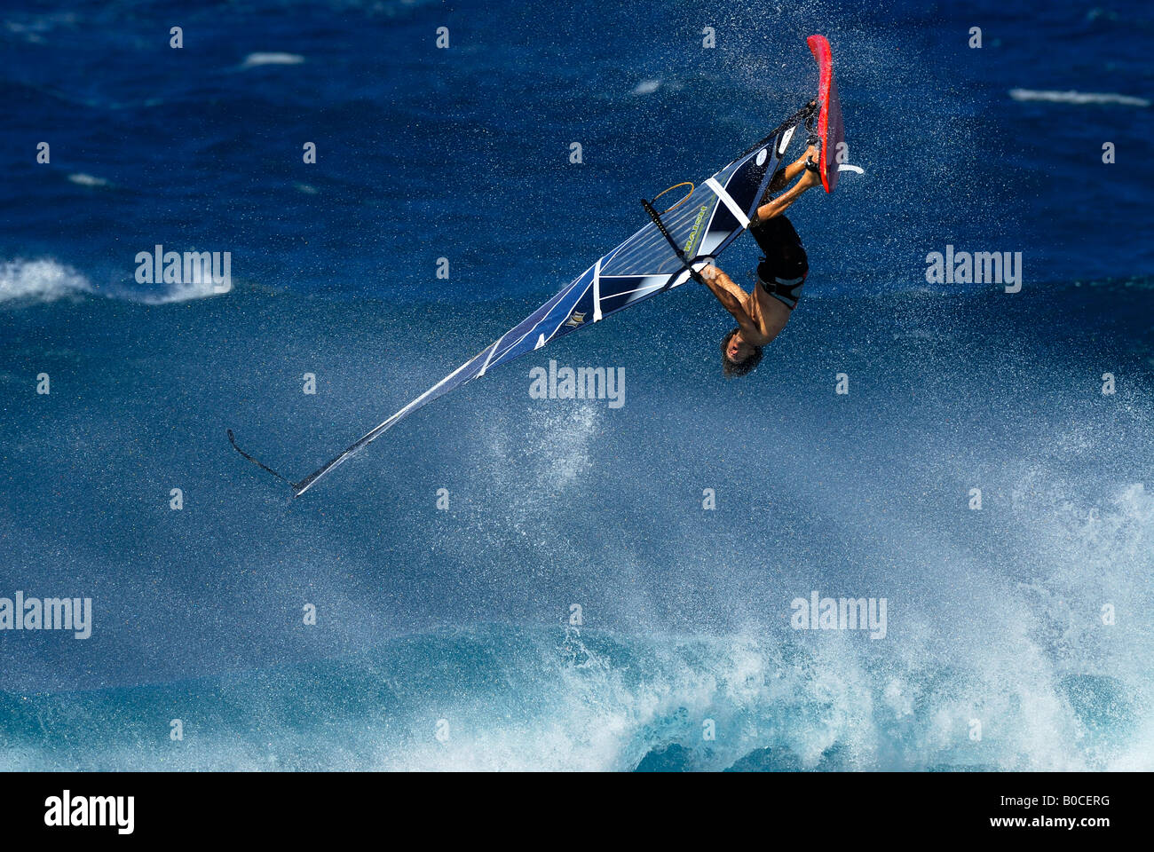 ariel jump in the waves in Maui Hawaii Stock Photo - Alamy