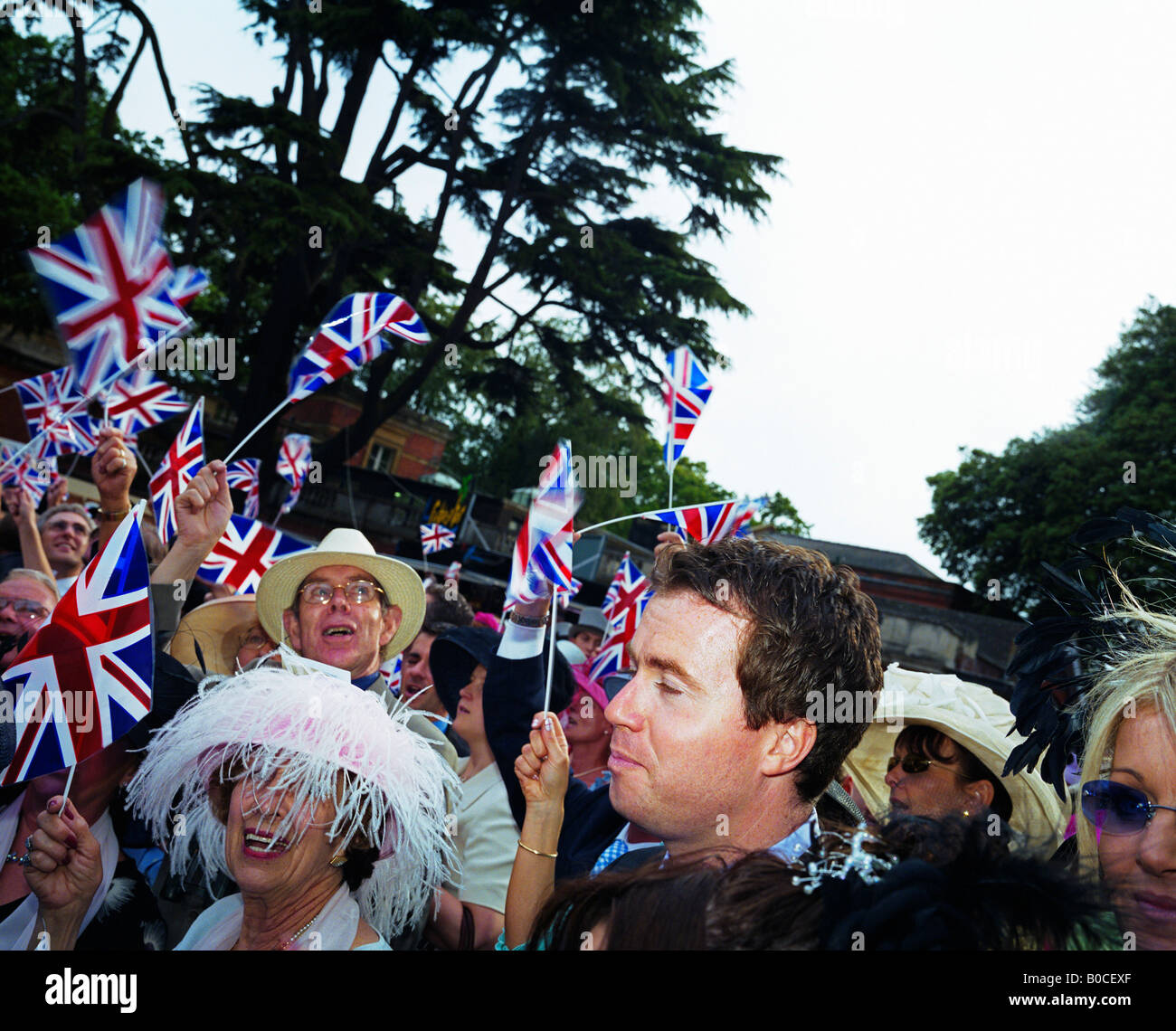 A mixed patriotic crowd sing and wave union jack flags during Ladies ...