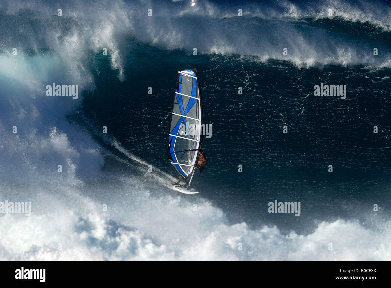 Big wave sailing at Ho'okipa Beach Maui Hawaii Stock Photo - Alamy