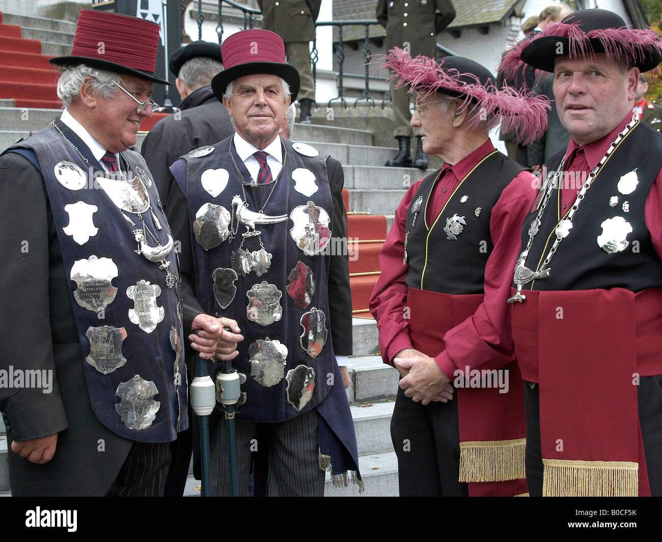 Four members of the Freemans of a Guild, wearing proudly all their ...