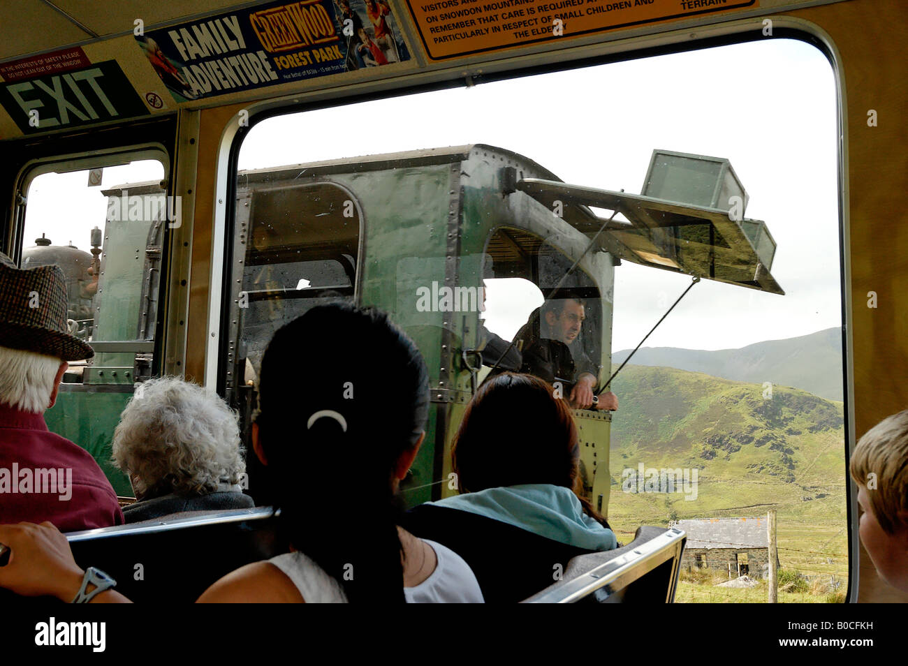 Trains passing on Snowdonia mountain railway Stock Photo - Alamy