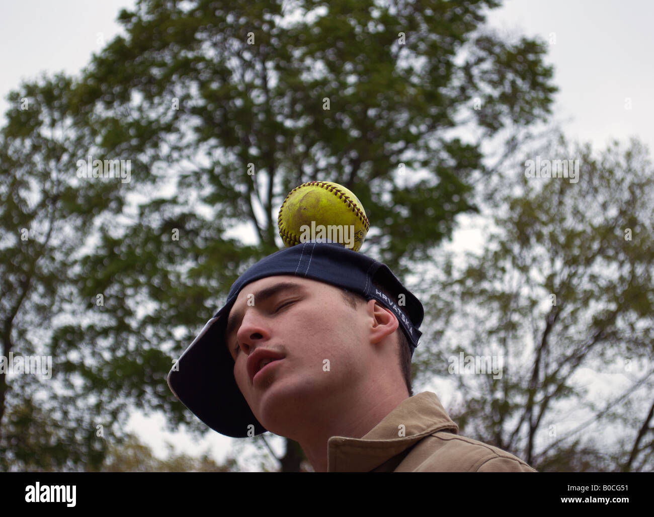 guy getting hit on the head with the softball, messing around in the ...