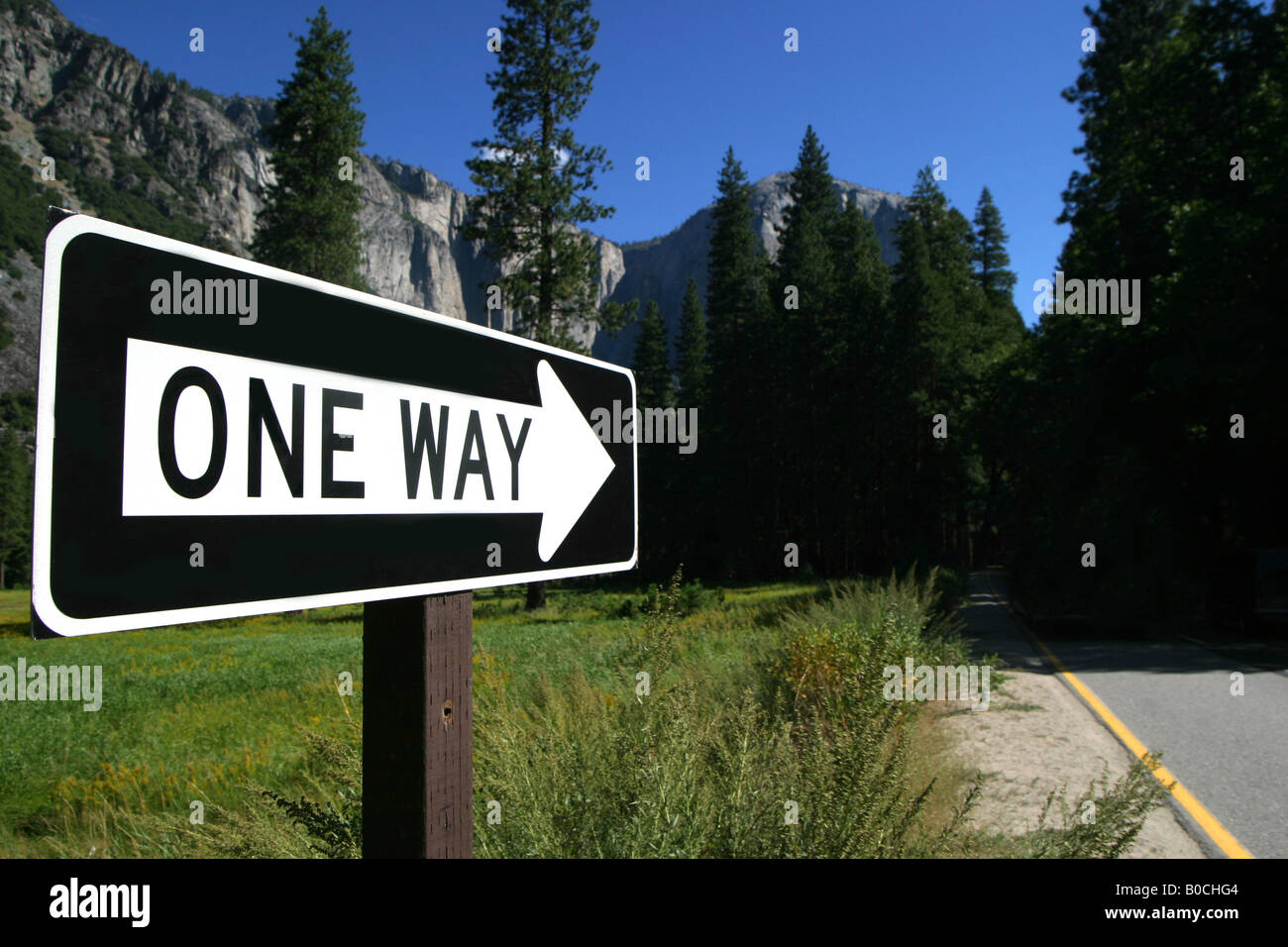 One Way roadsign in mountain range Stock Photo - Alamy