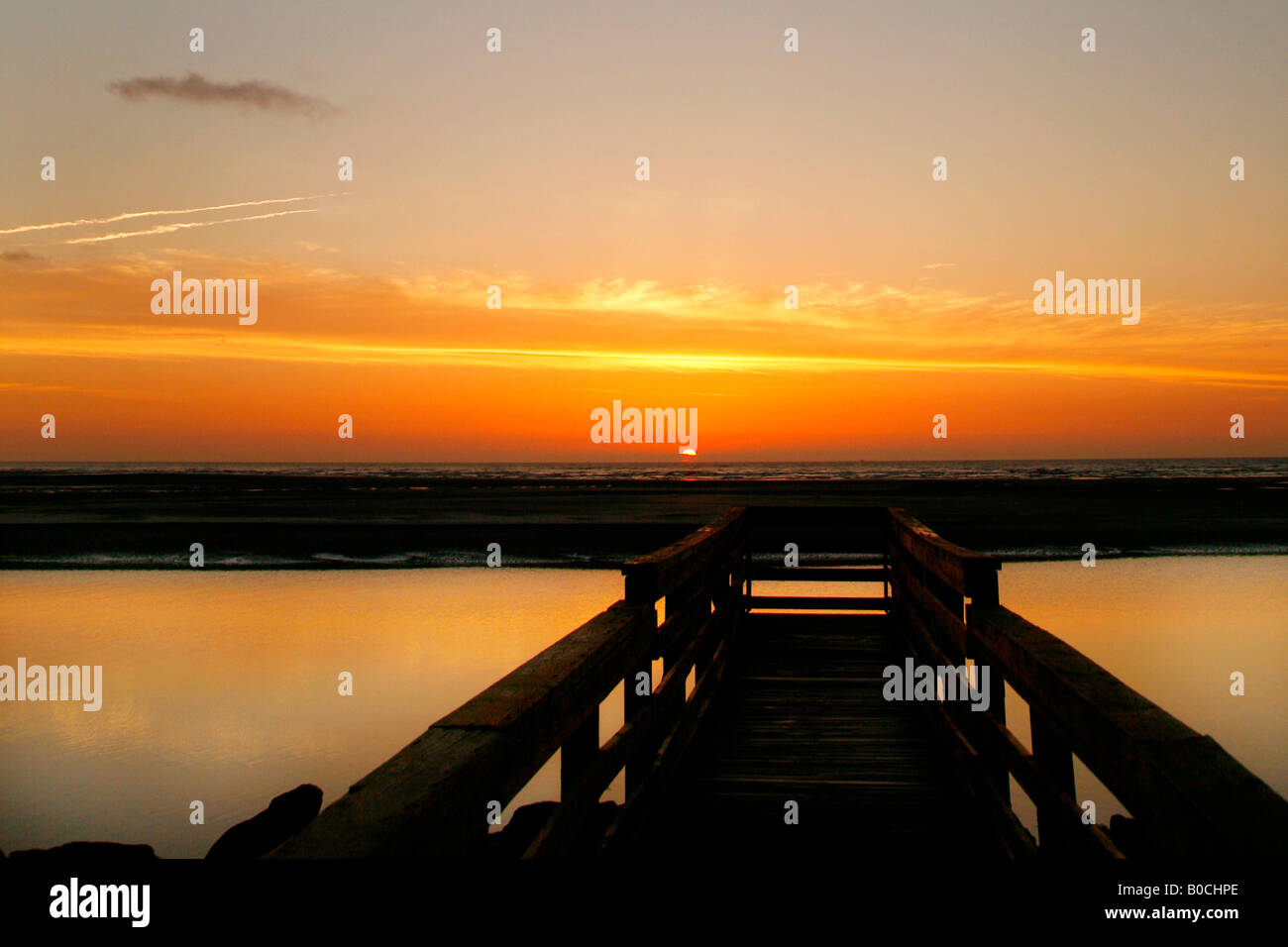 Sunrise over pier , St. Simons Island, Georgia Stock Photo - Alamy